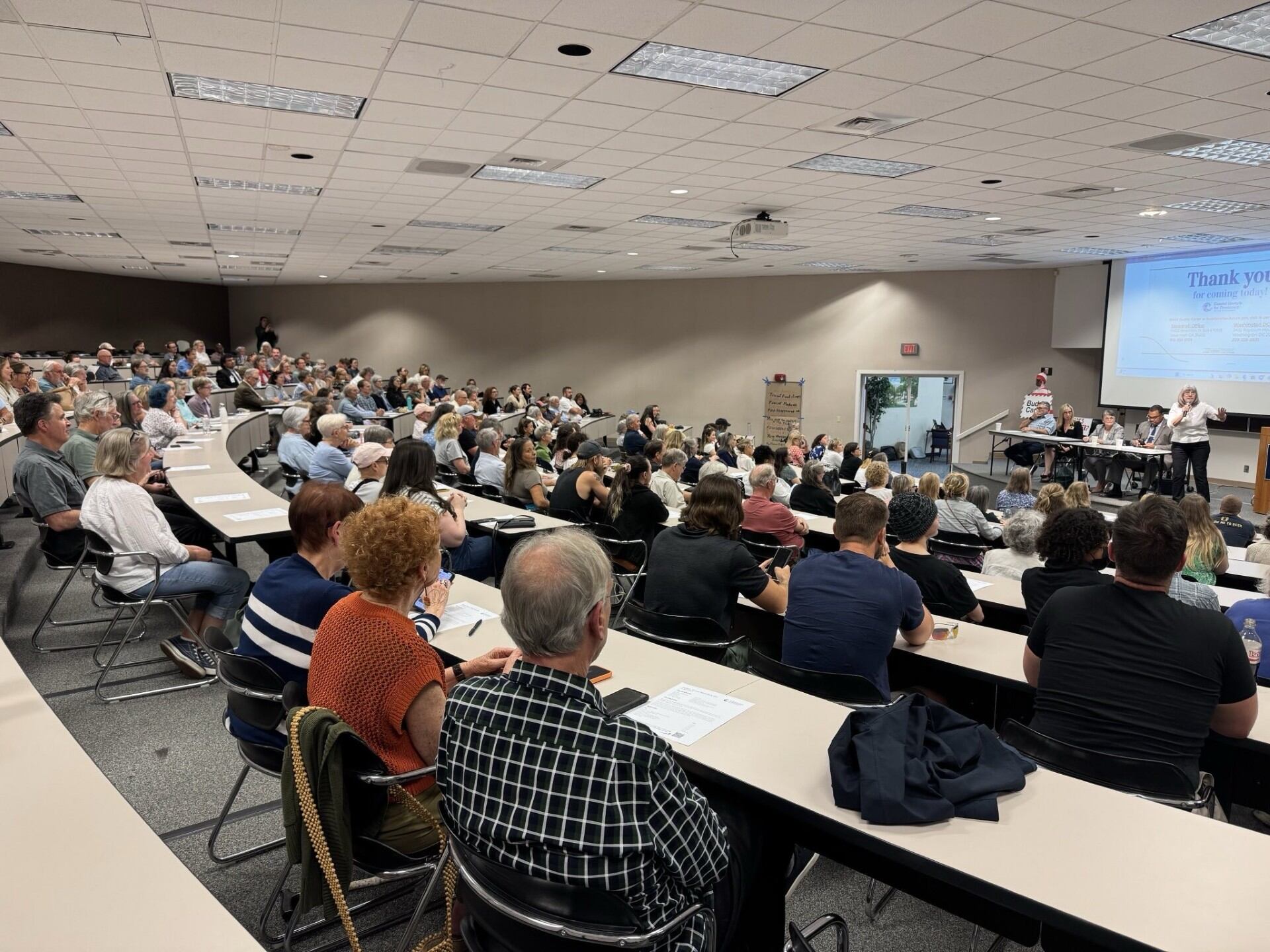 Local group hosts “empty chair” town hall