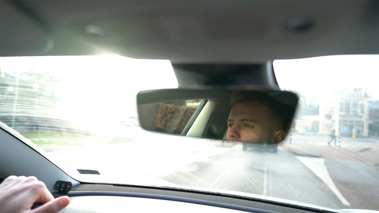 Driving A Car Near The Traffic Light Area