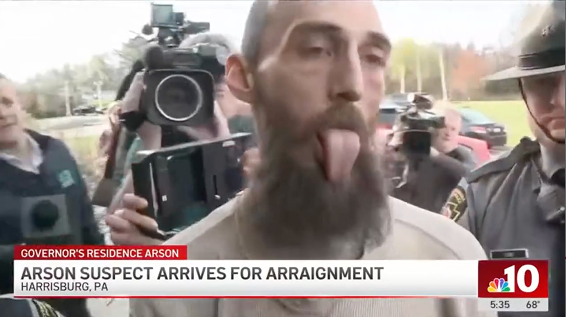 Shapiro Firebomb Suspect Makes Creepy Faces During His Perp Walk on ...