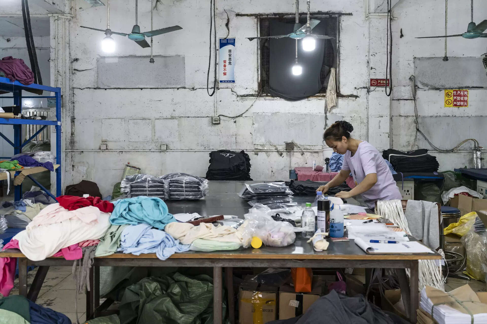 Inside factories in China, a struggle to survive Trump's tariffs