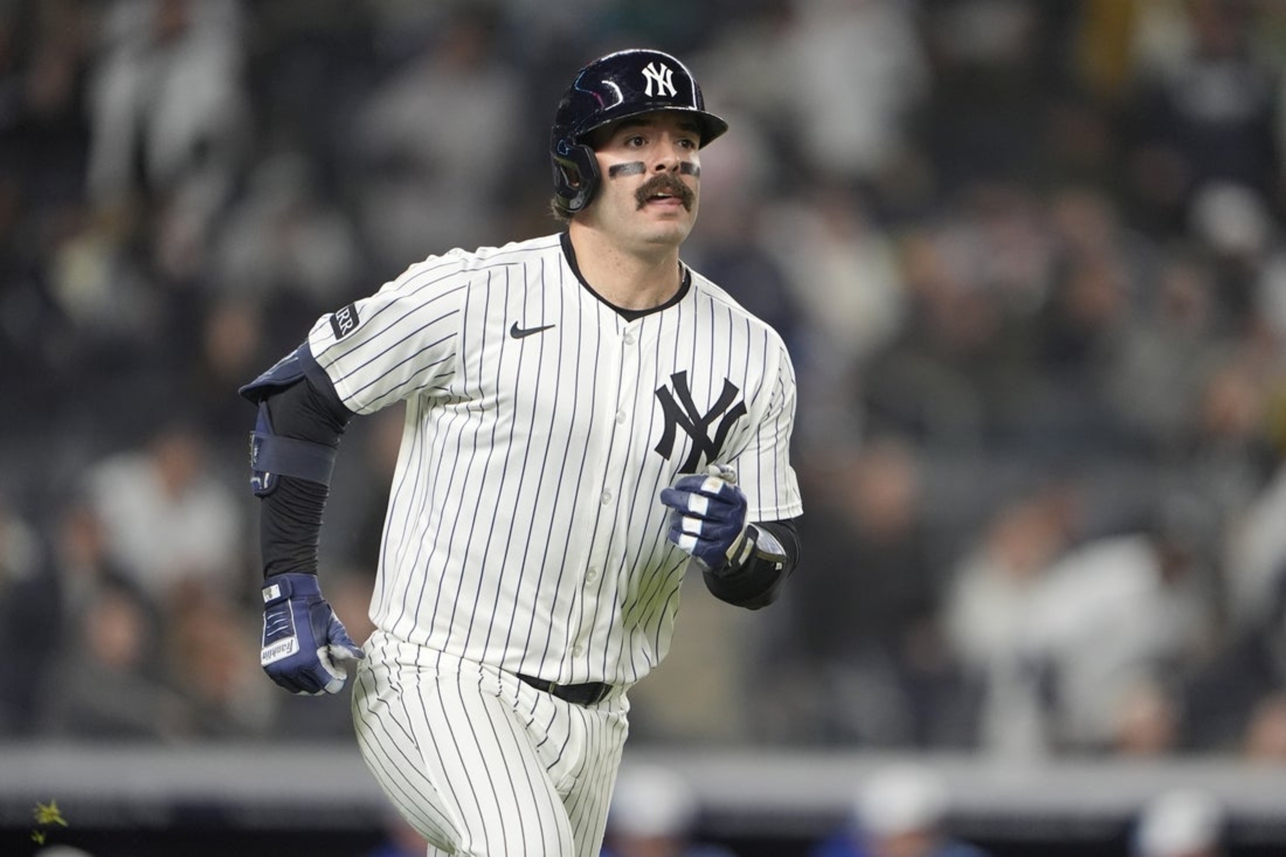 Yankees use four home runs to defeat Royals