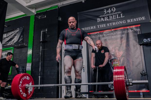 Newport prison officer breaks British bench press record