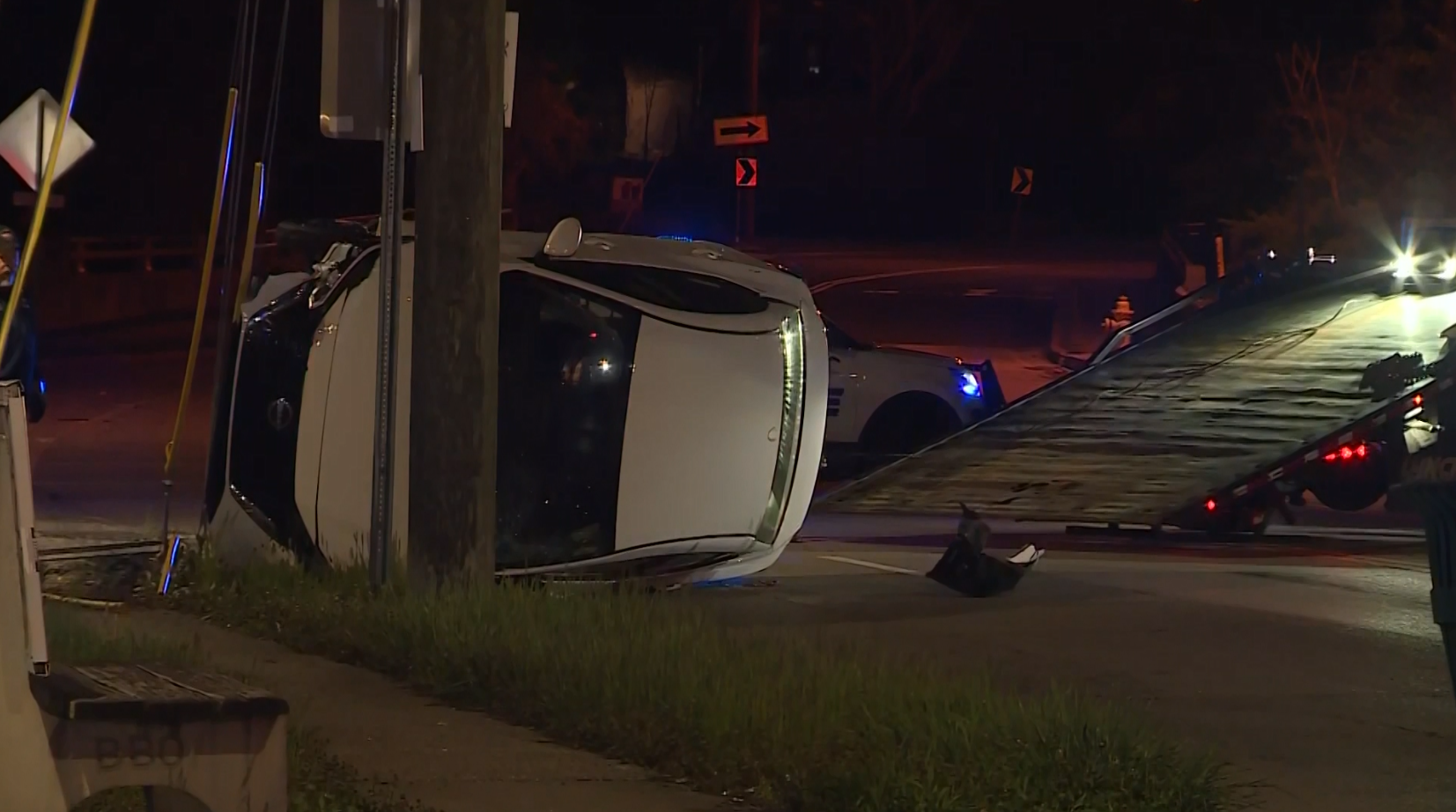 Police searching for driver after car flips, hits utility pole in ...