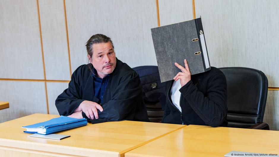 Man fined after hugging German Chancellor Olaf Scholz