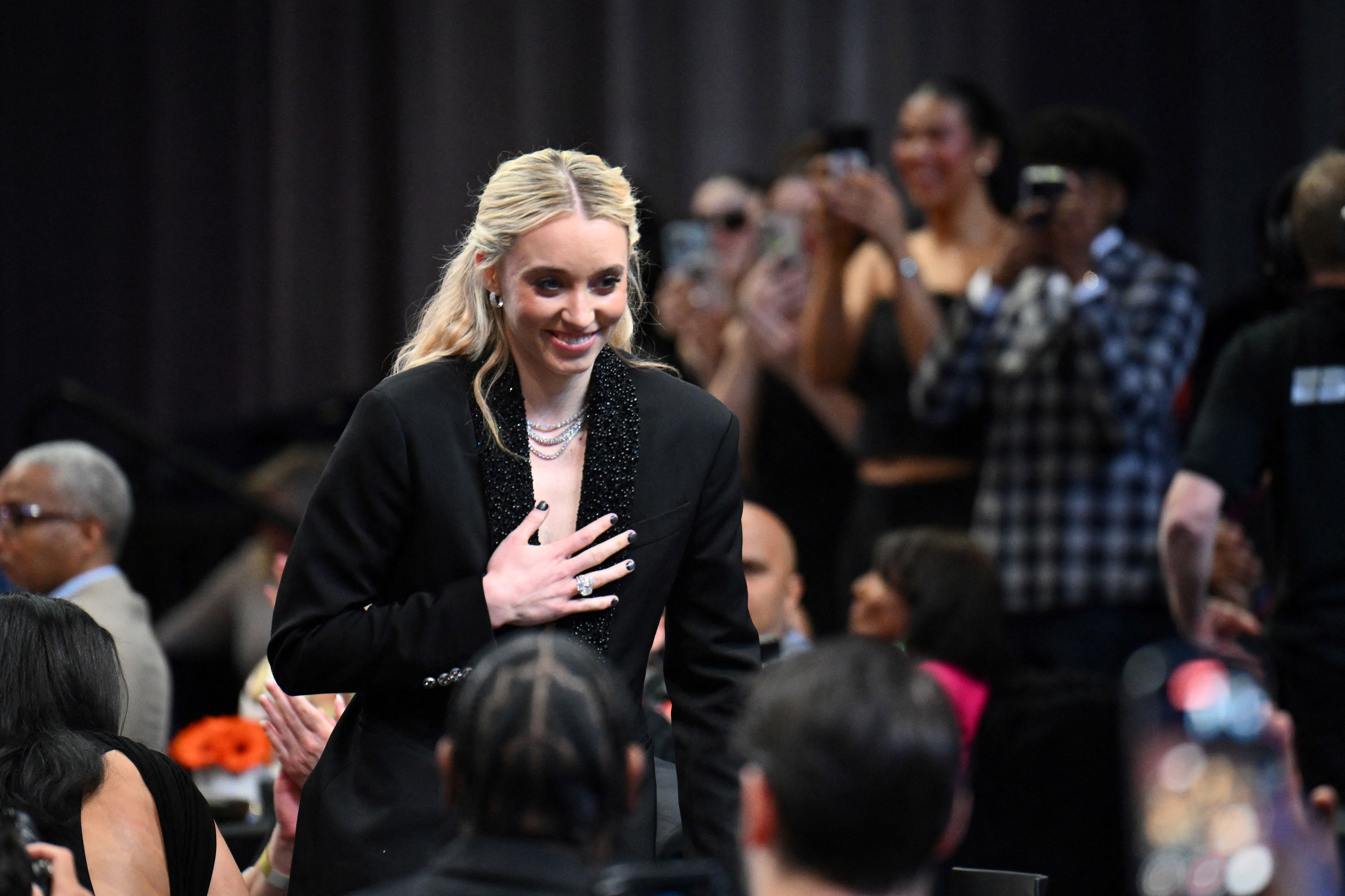 Paige Bueckers pulls double duty in pair of sparkly suits at WNBA 2025 ...