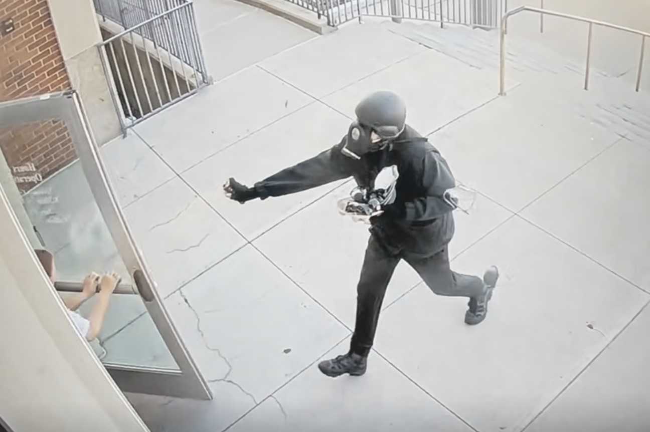 Video shows man in gas mask storm Mass. courthouse with pepper spray