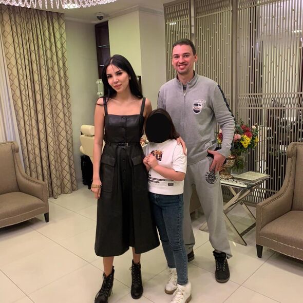 Boss accused of working for Putin's 'secret family' breaks silence