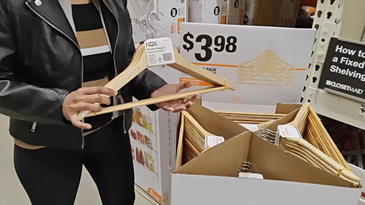 Grab a pack of Home Depot hangers for this BRILLIANT living room hack!