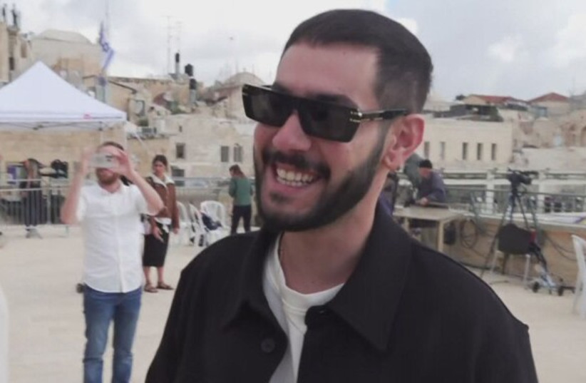Former hostage Eliya Cohen makes first visit to Western Wall after release