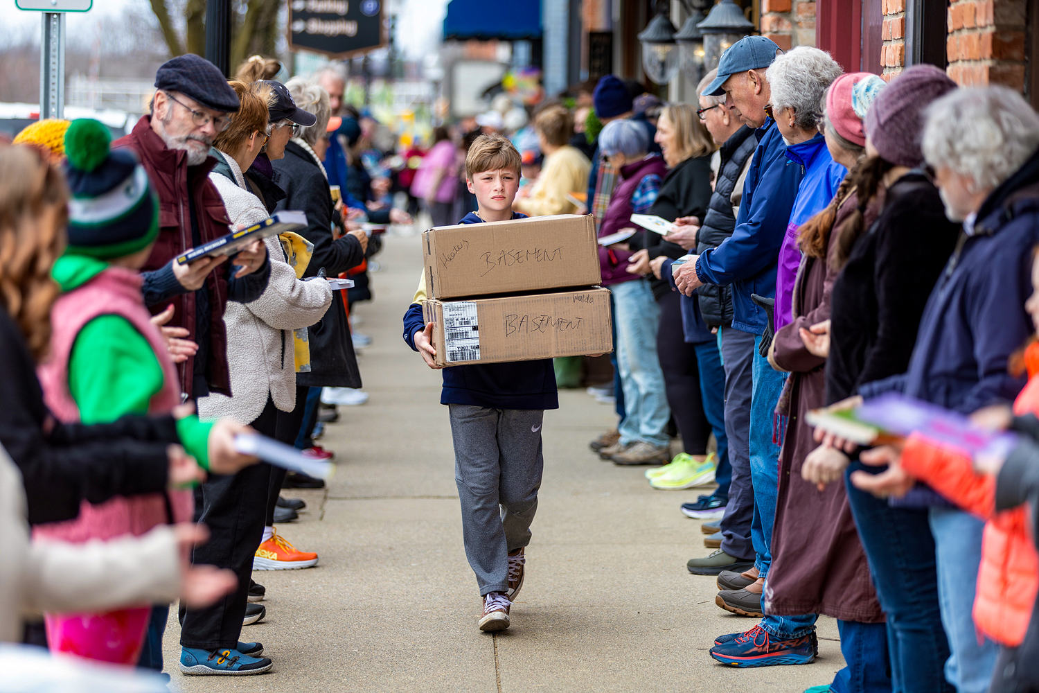 A Michigan community takes a novel approach to moving 9,100 books for ...