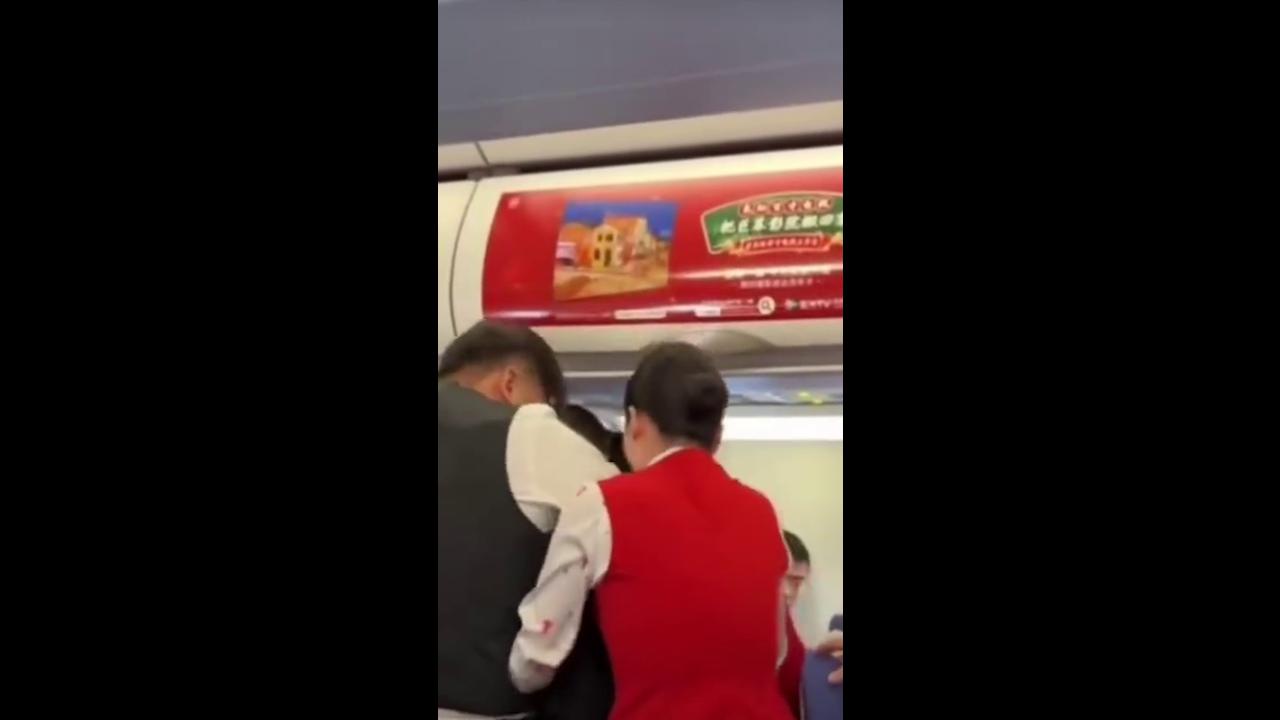 Cabin crew BITTEN as row over 'smelly passenger' erupts on Air China flight