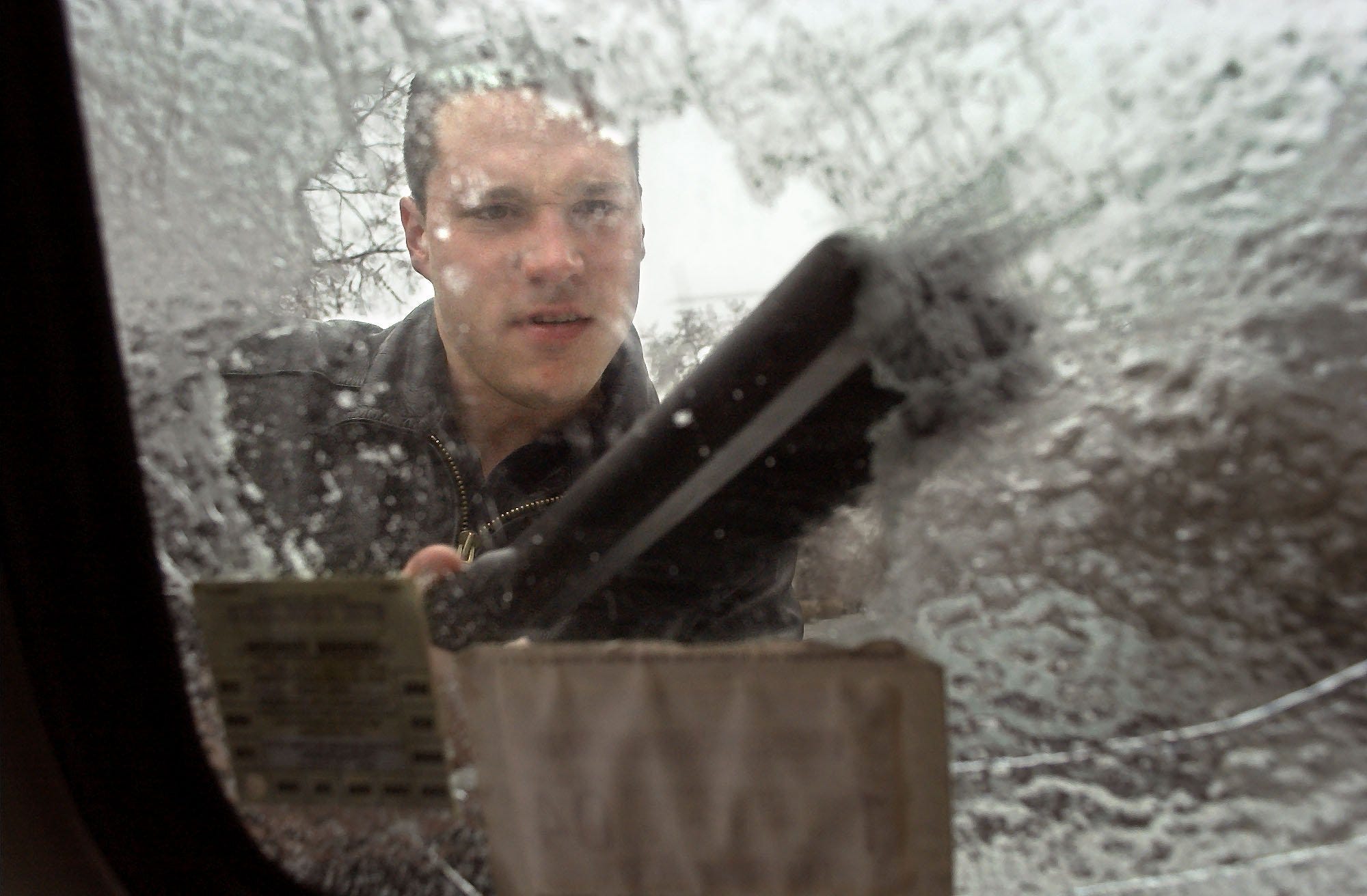 Tired of scraping your frozen windshield? Try this easy trick to melt ...