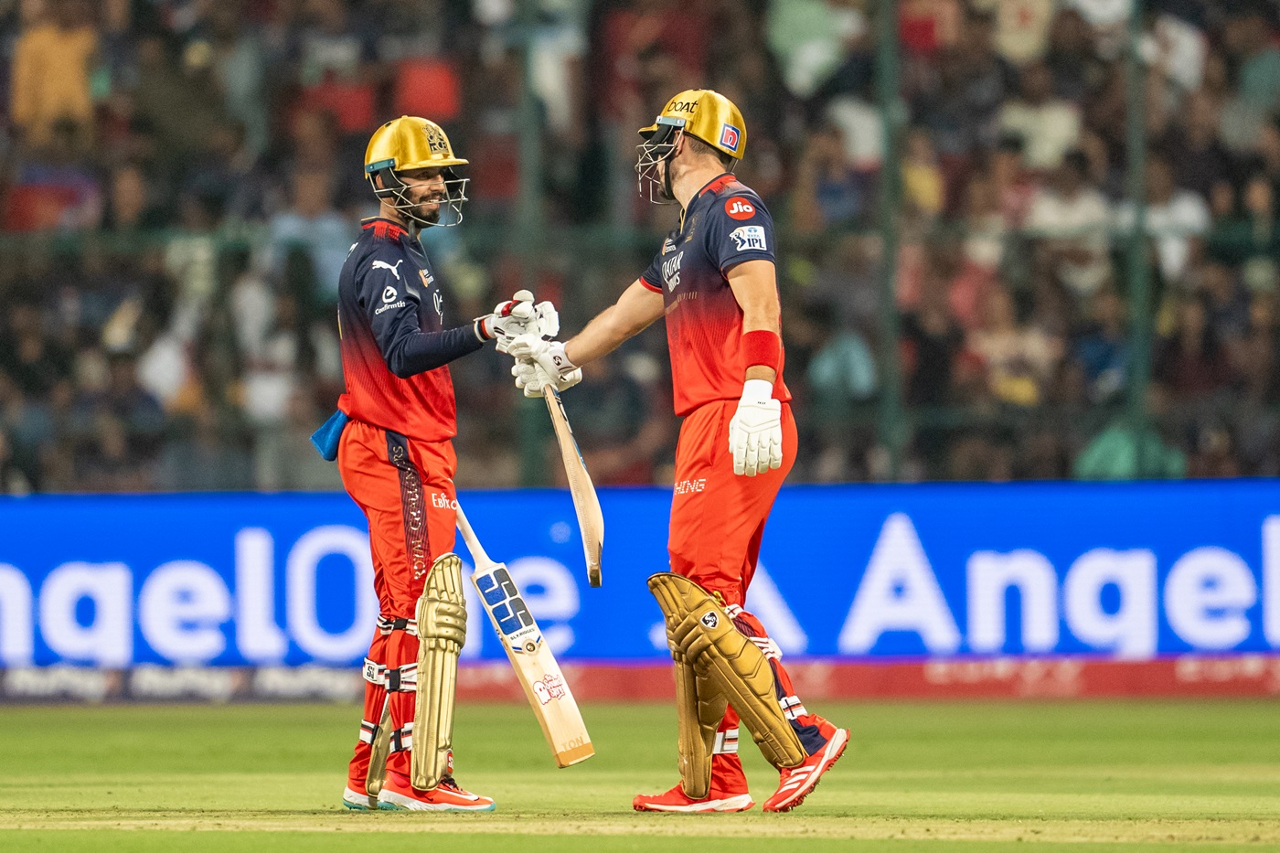 Livingstone fifty, cameos from Jitesh and David propel RCB despite ...