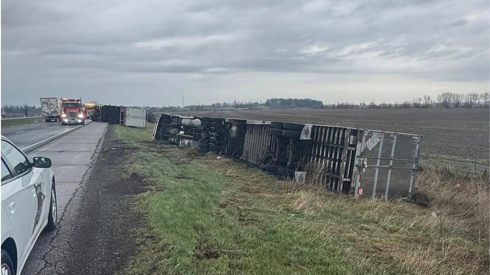 Five semi-trucks blown over by the wind on I-65 in Lake County
