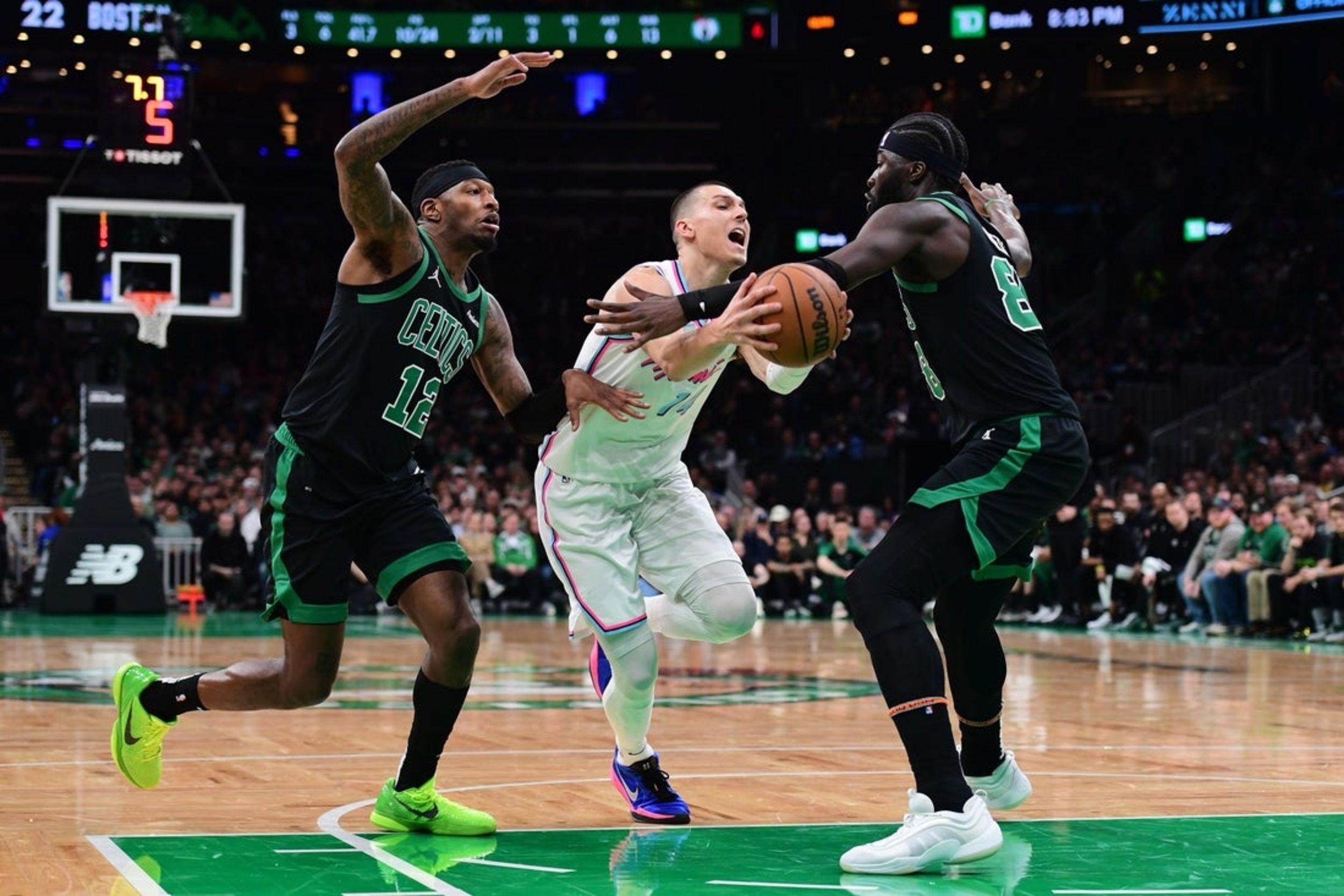 Surging Heat halt Celtics' 9-game win streak in blowout