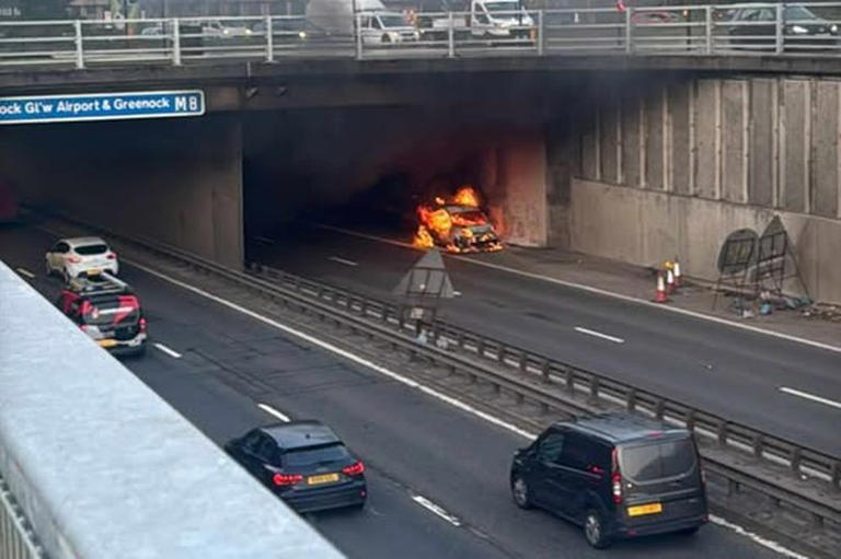 Glasgow M8 travel chaos as vehicle bursts into flames on busy carriageway