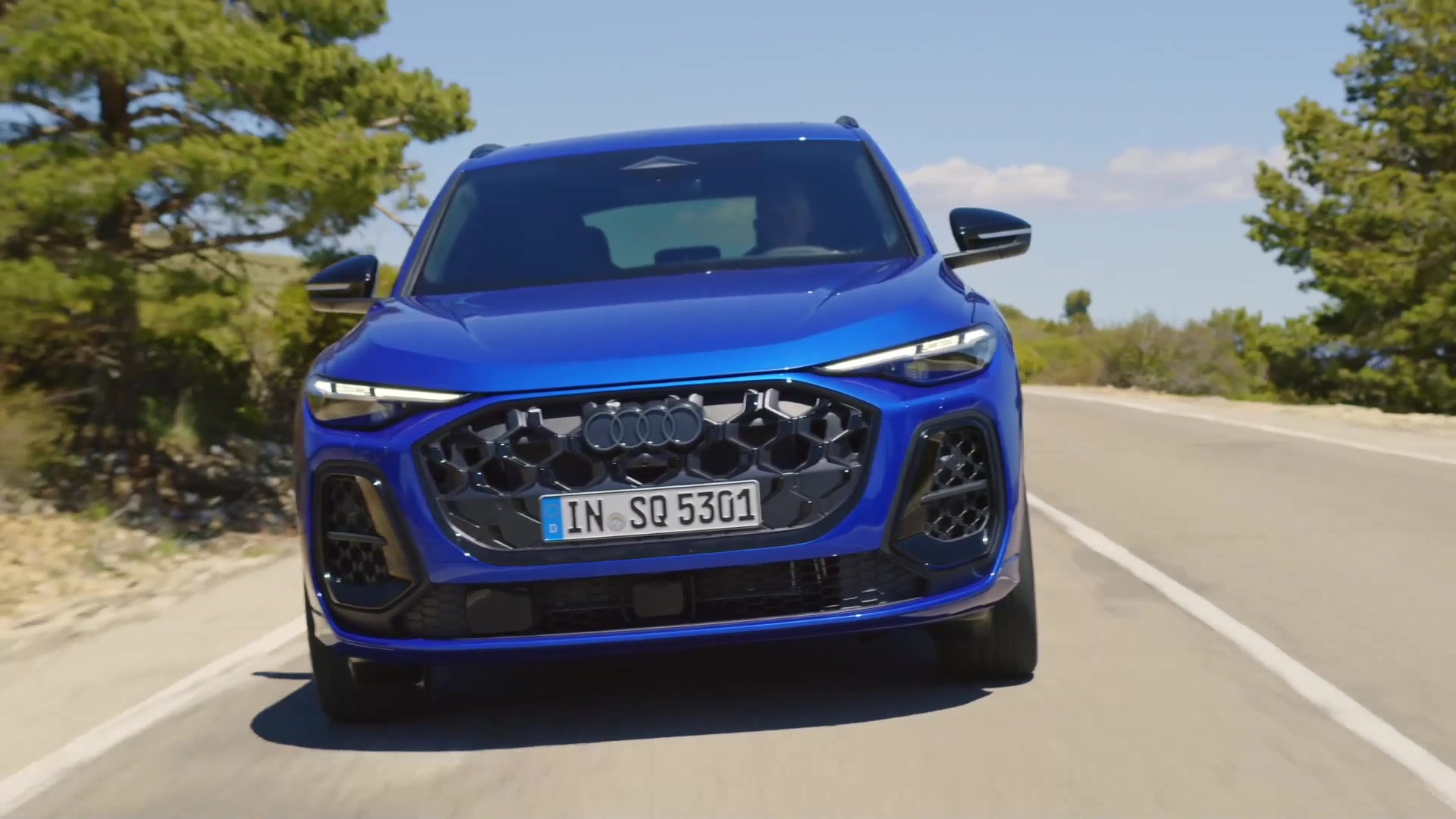 The new Audi SQ5 SUV in Ultra blue metallic Driving Video