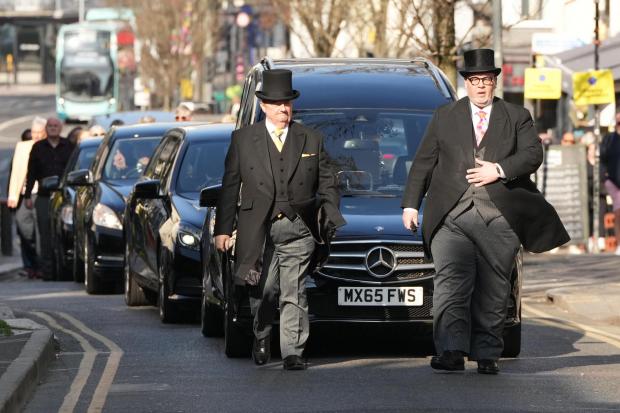 People line the streets to pay their respects to Britain's oldest drag ...
