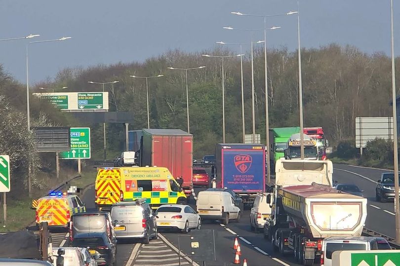 Paramedics and police at A50 smash between truck and car