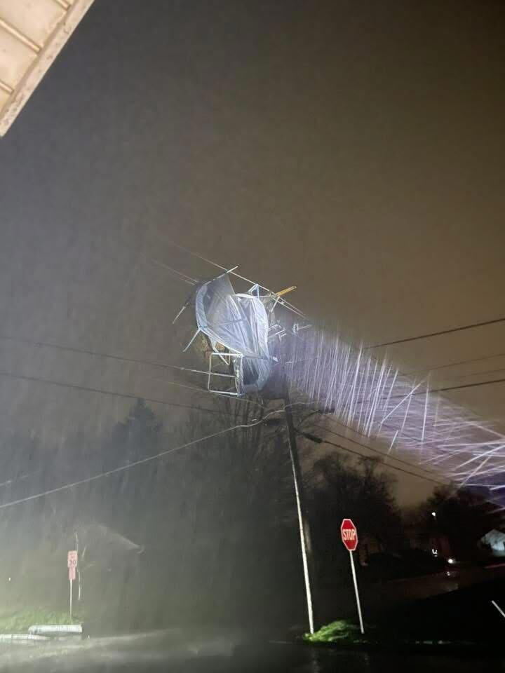 Yes, that's a trampoline caught in utility lines. Check out these ...