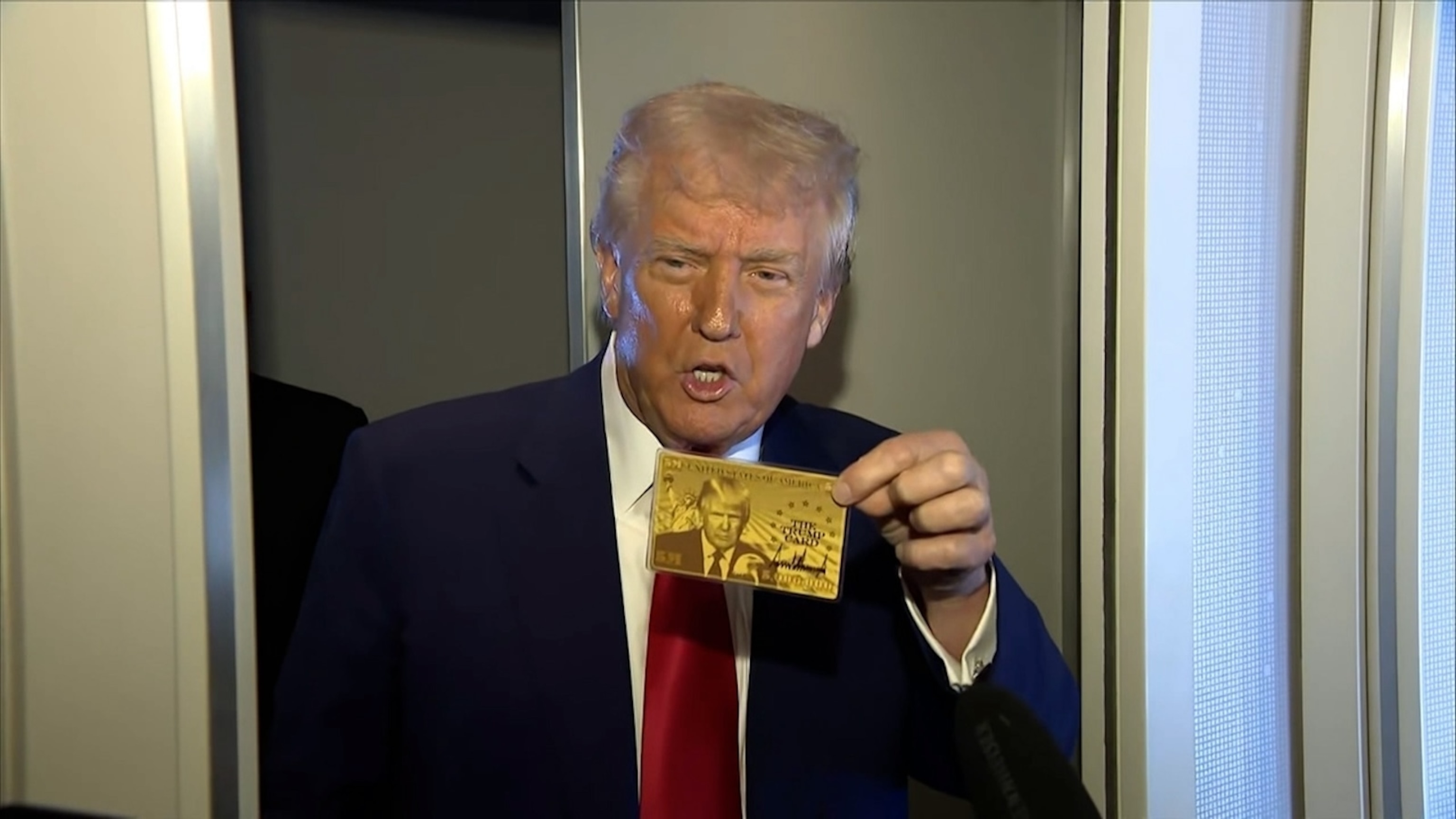 Trump unveils $5 million 'gold card' while aboard Air Force One