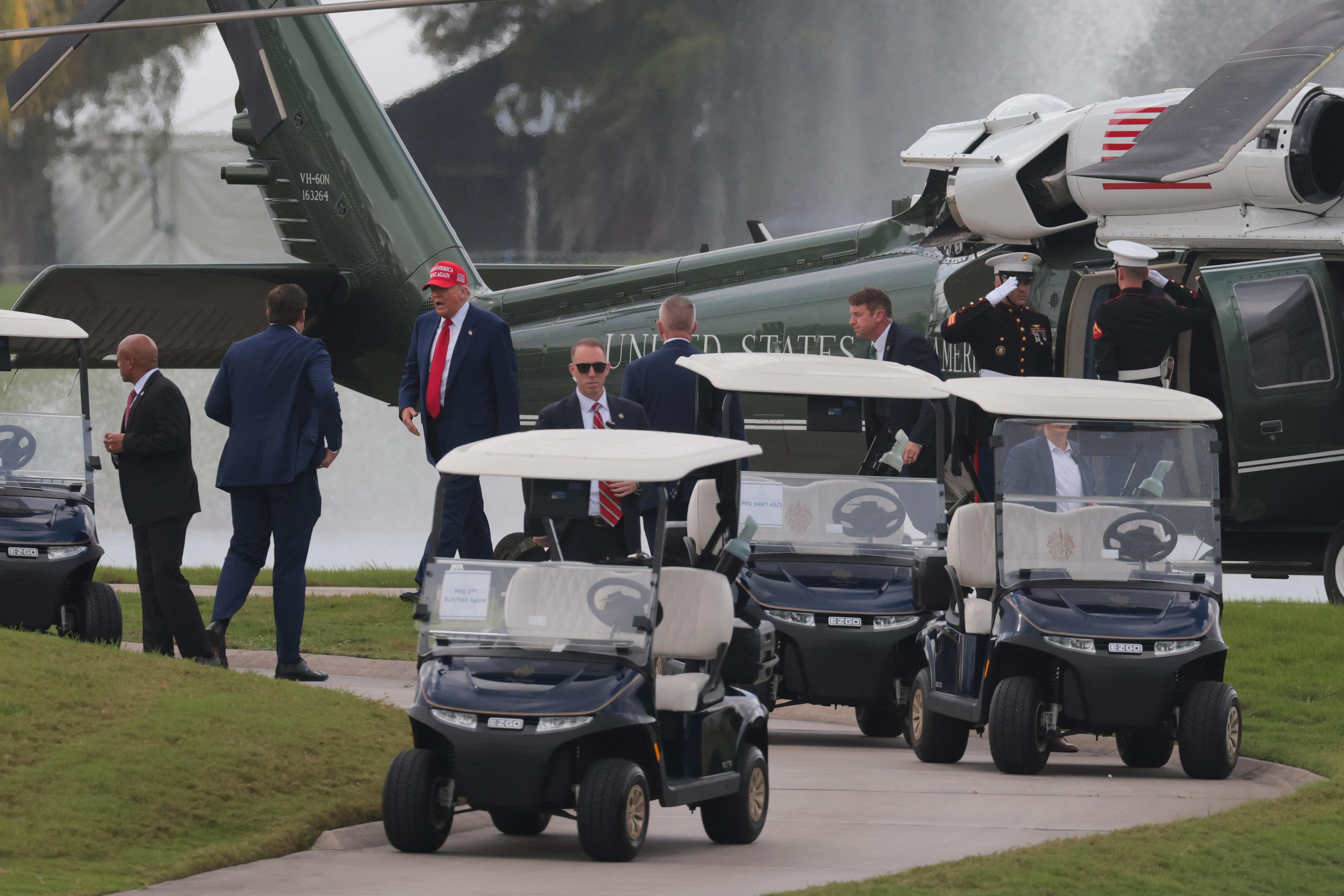 WATCH: President Trump arrives via helicopter on golf course at Trump ...