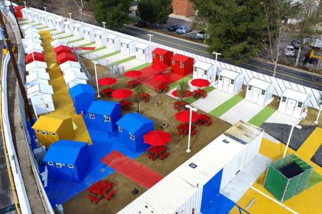 Group transforms 'oddly shaped' parking lot into vibrant tiny-home ...