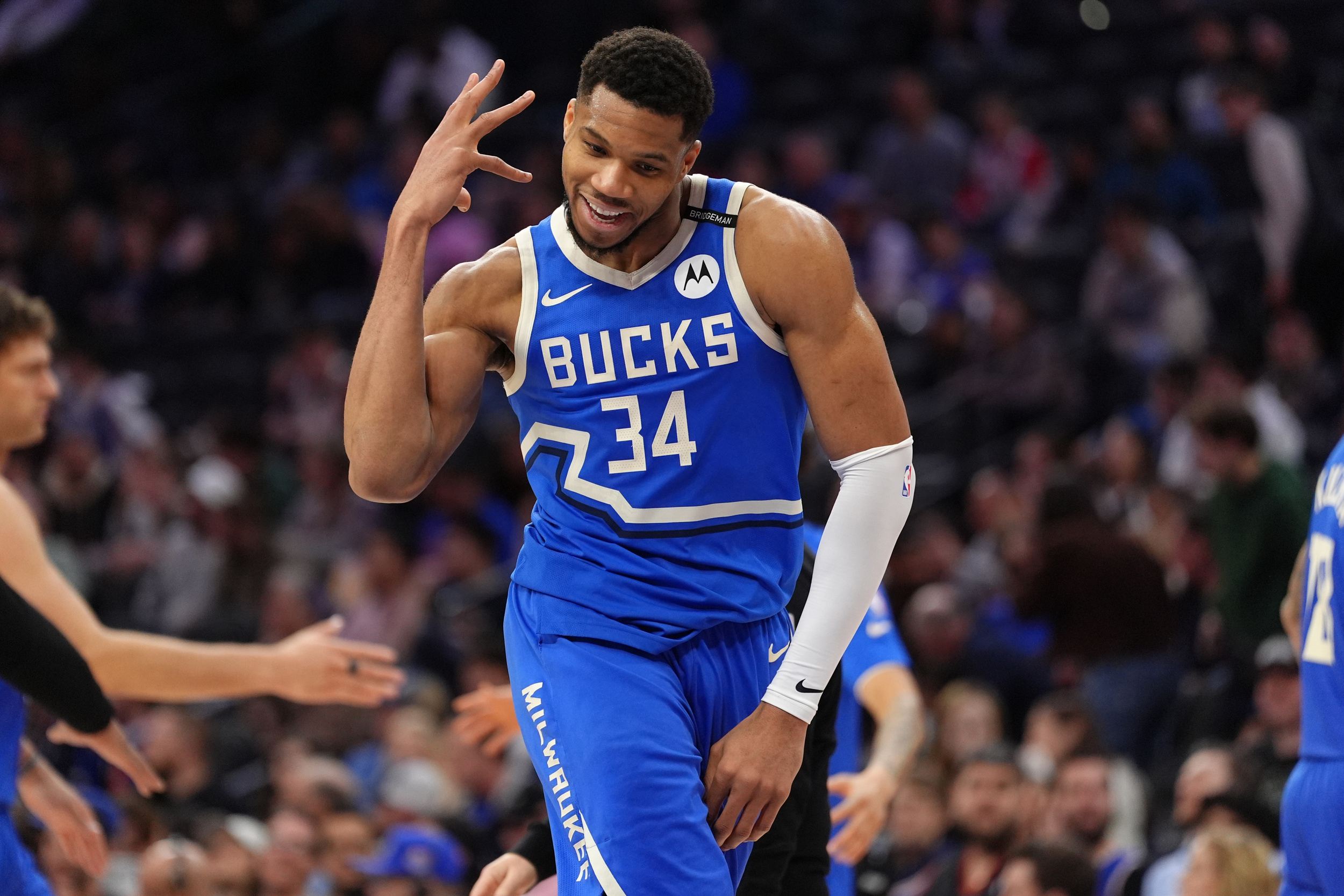 Giannis Antetokounmpo's 20-assist triple-double rescues Bucks against 76ers