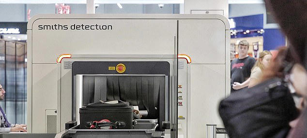 Pictured: The new airport scanner that's done away with the need to put ...