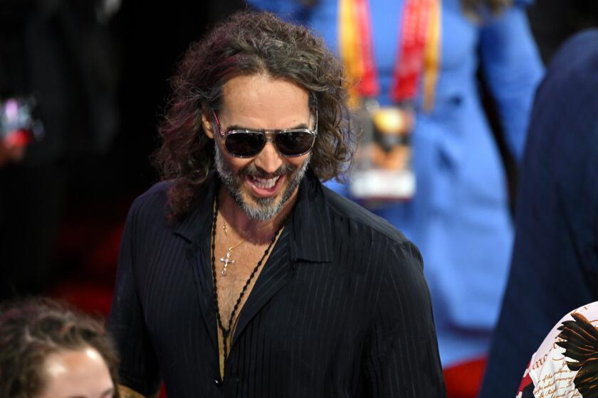 Russell Brand denies allegations after U.K charges him with rape and ...