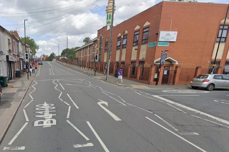 Police car on blue lights involved in Coventry road smash