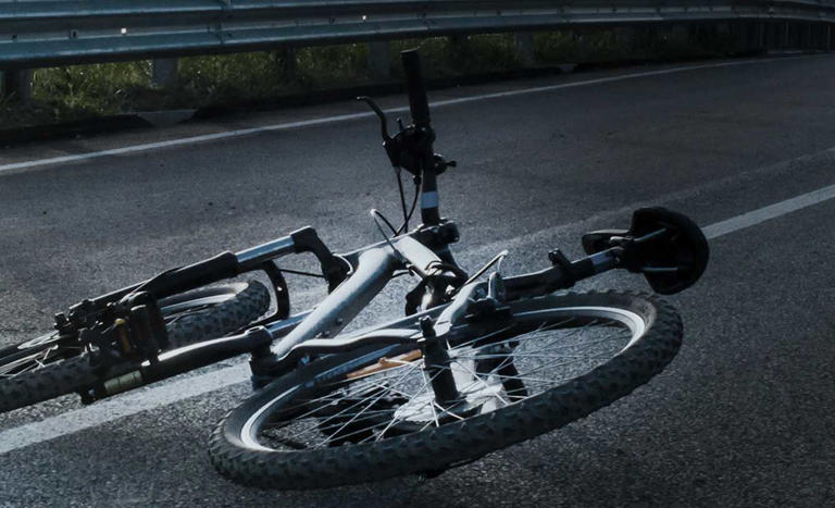 14-year-old on bicycle fires gun at moving car, police say