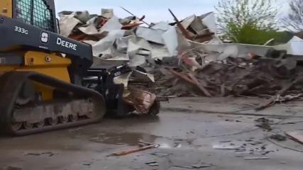 Cleanup crews clear the aftermath of severe storm damage