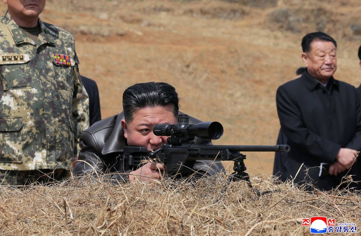 NKorea's Kim fires new sniper rifle while visiting troops