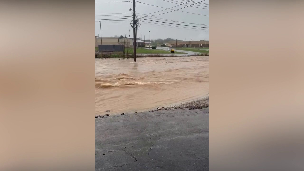 Floodwaters turned into a rushing river in Missouri town