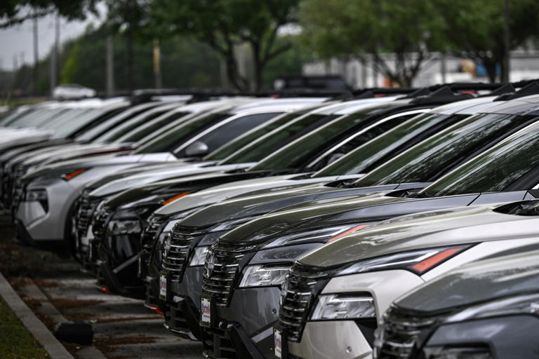 Trump tariffs live: Jaguar Land Rover pauses shipments to US as 10% ...