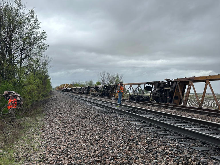 Straight-line winds knock train cars off tracks