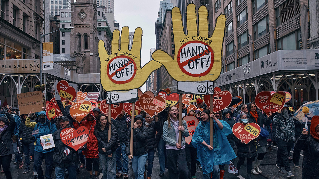 Protesters in NYC target Trump and Musk in 'Hands Off!' rally; over ...