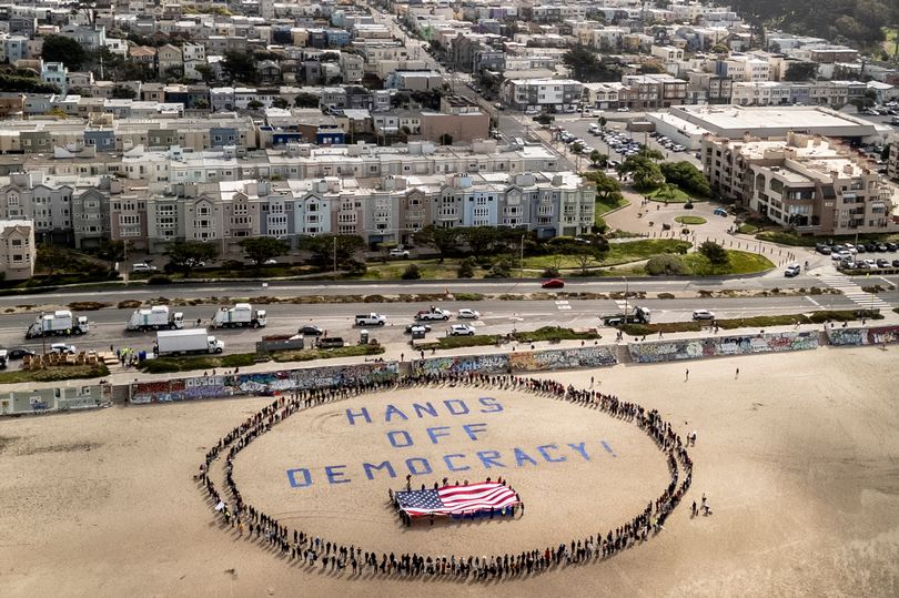 Californians form human banner at anti-Trump and Musk 'Hands Off ...