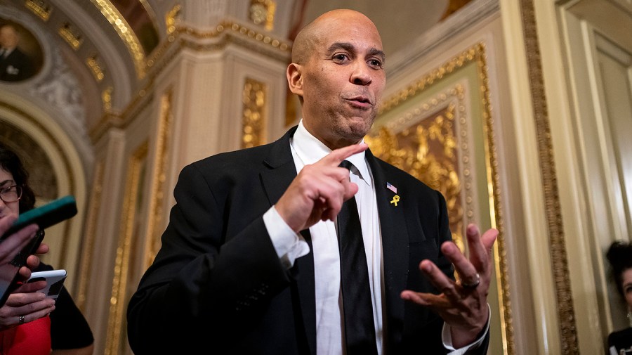 Booker wades into Virginia attorney general race