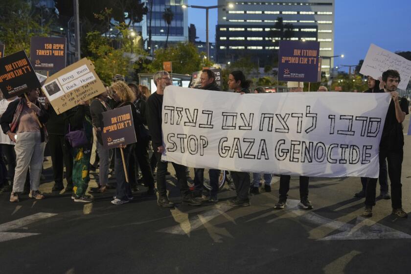 Israeli troops deploy to a new security corridor across southern Gaza