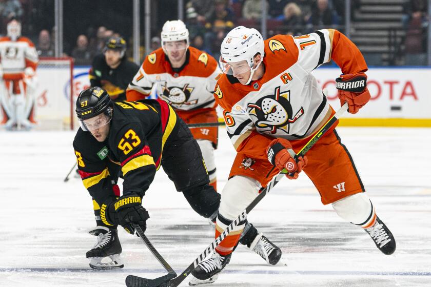 Ducks score first, then give up five first-period goals in loss to Canucks