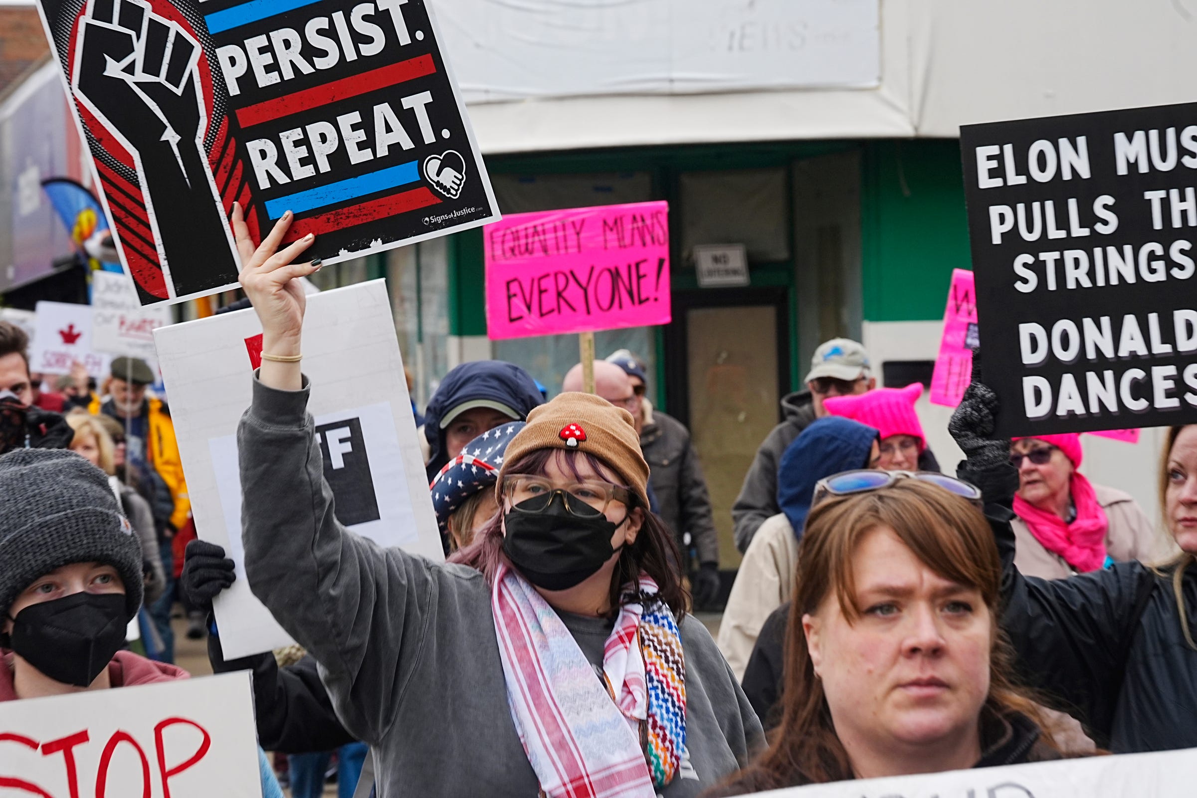 Thousands protest Trump, Musk across Michigan