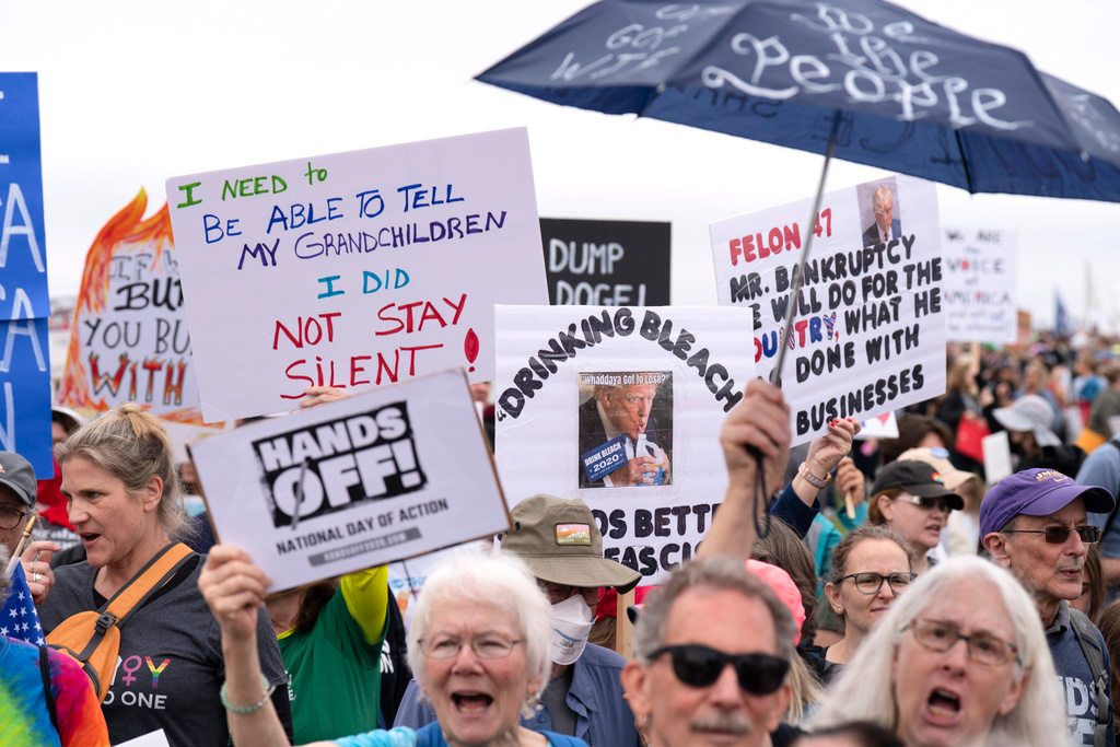 AP PHOTOS: From Manhattan to Alaska, protesters rally against Trump and ...