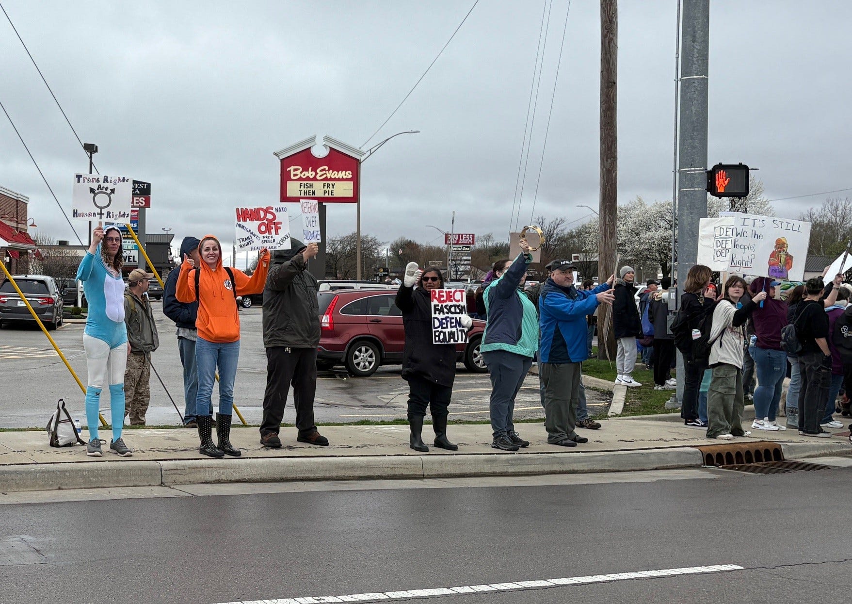 'Hands off' protest staged at Muncie's busiest intersection