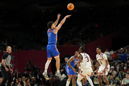 Gators, Walter Clayton close out Auburn to reach title game