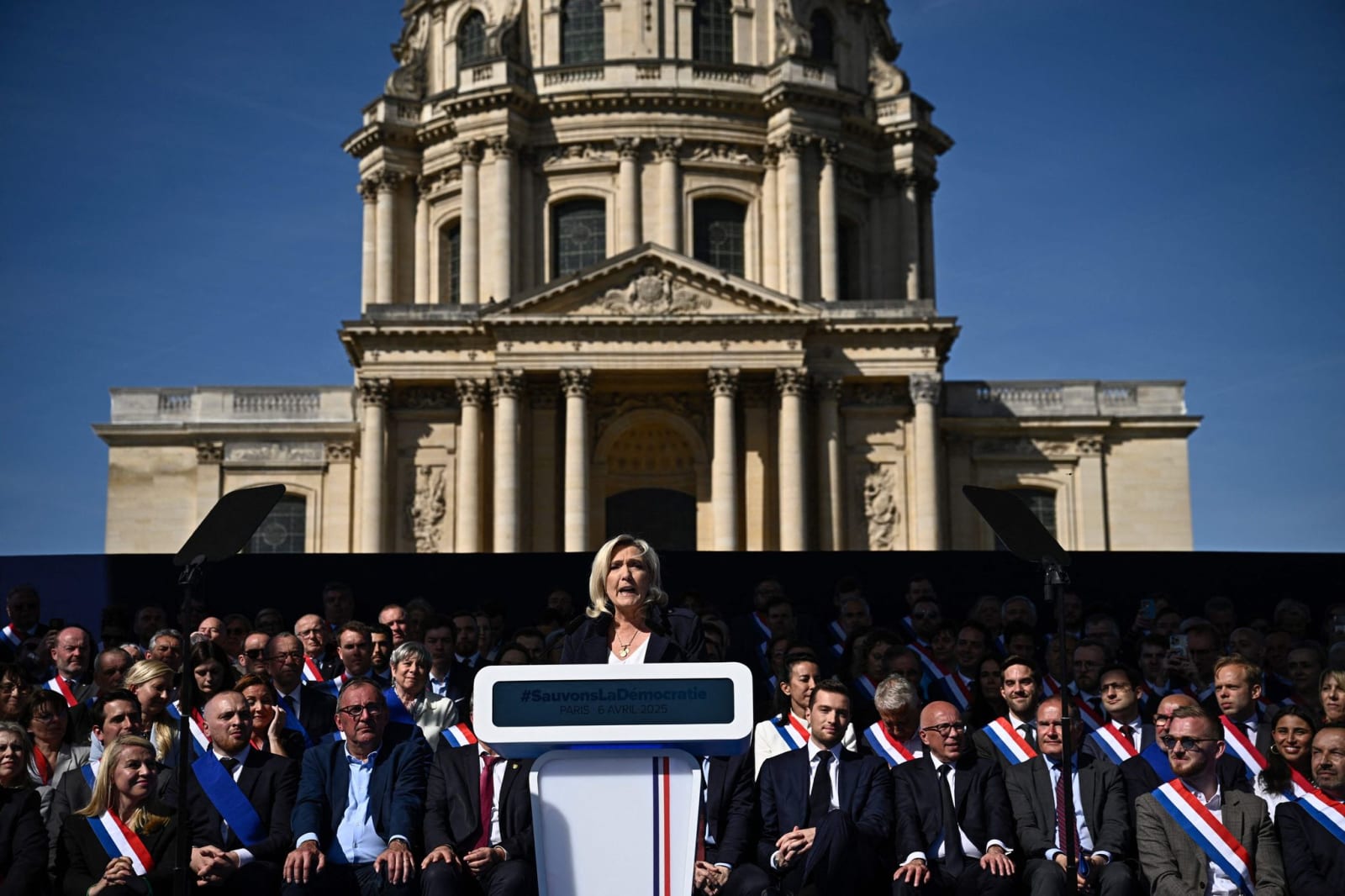 Thousands join Paris far-right march against Le Pen's election ban