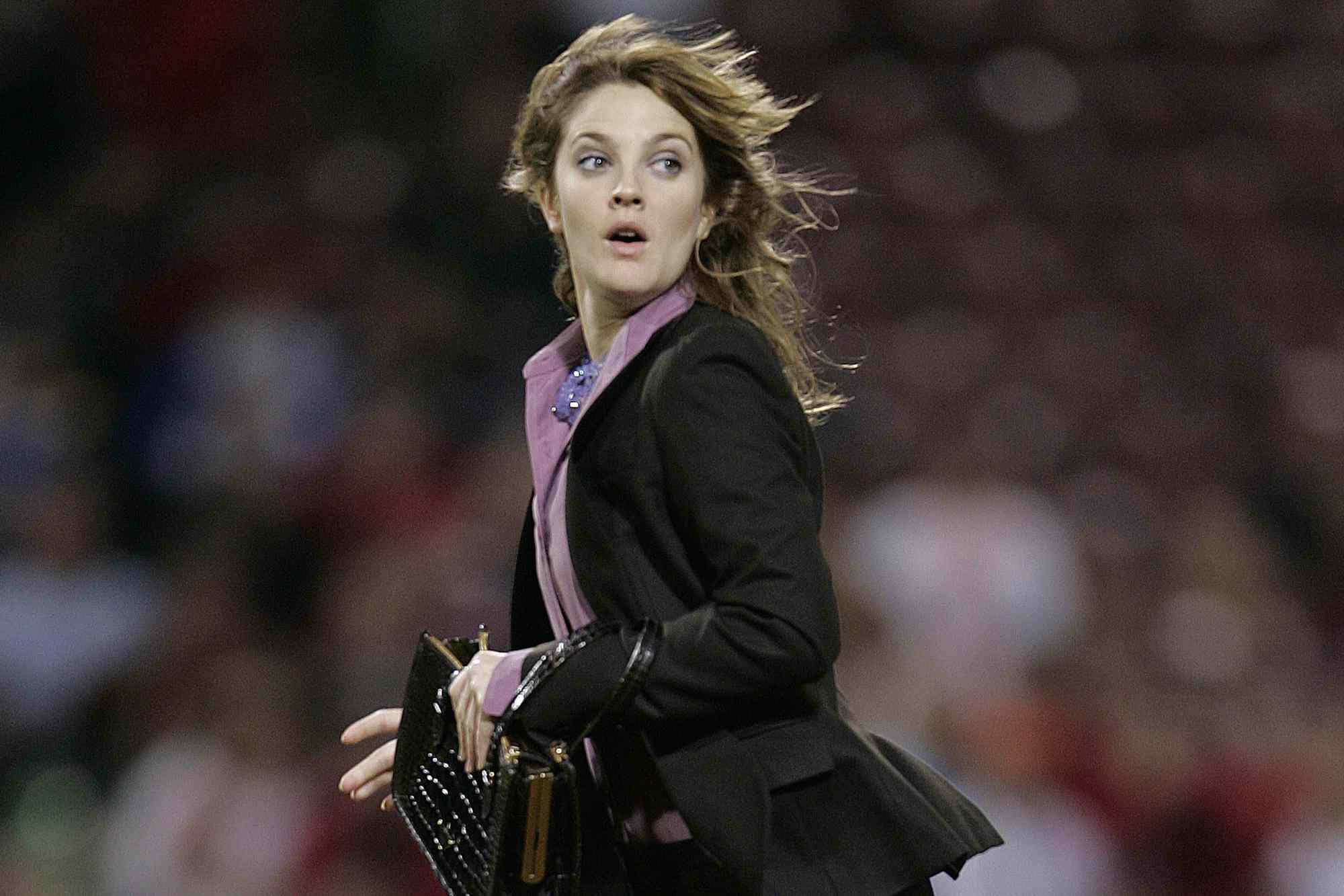 Drew Barrymore still has a 'bad back' after falling in “Fever Pitch ...