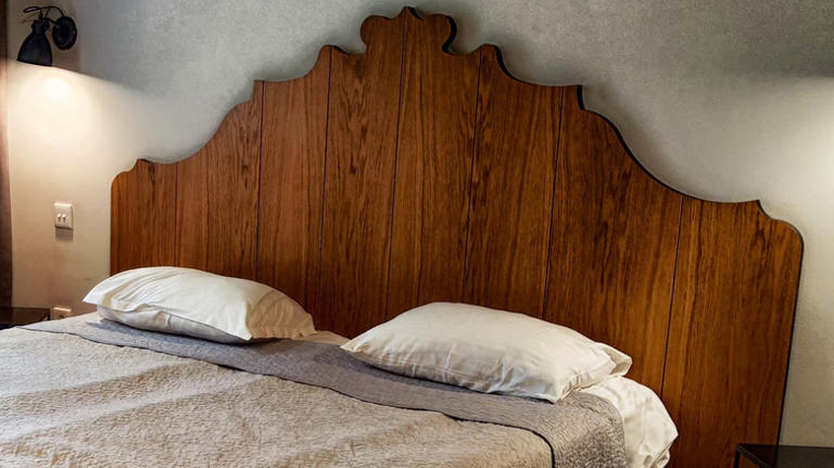 How To Use A Thrifted Headboard For A Custom Fireplace Surround