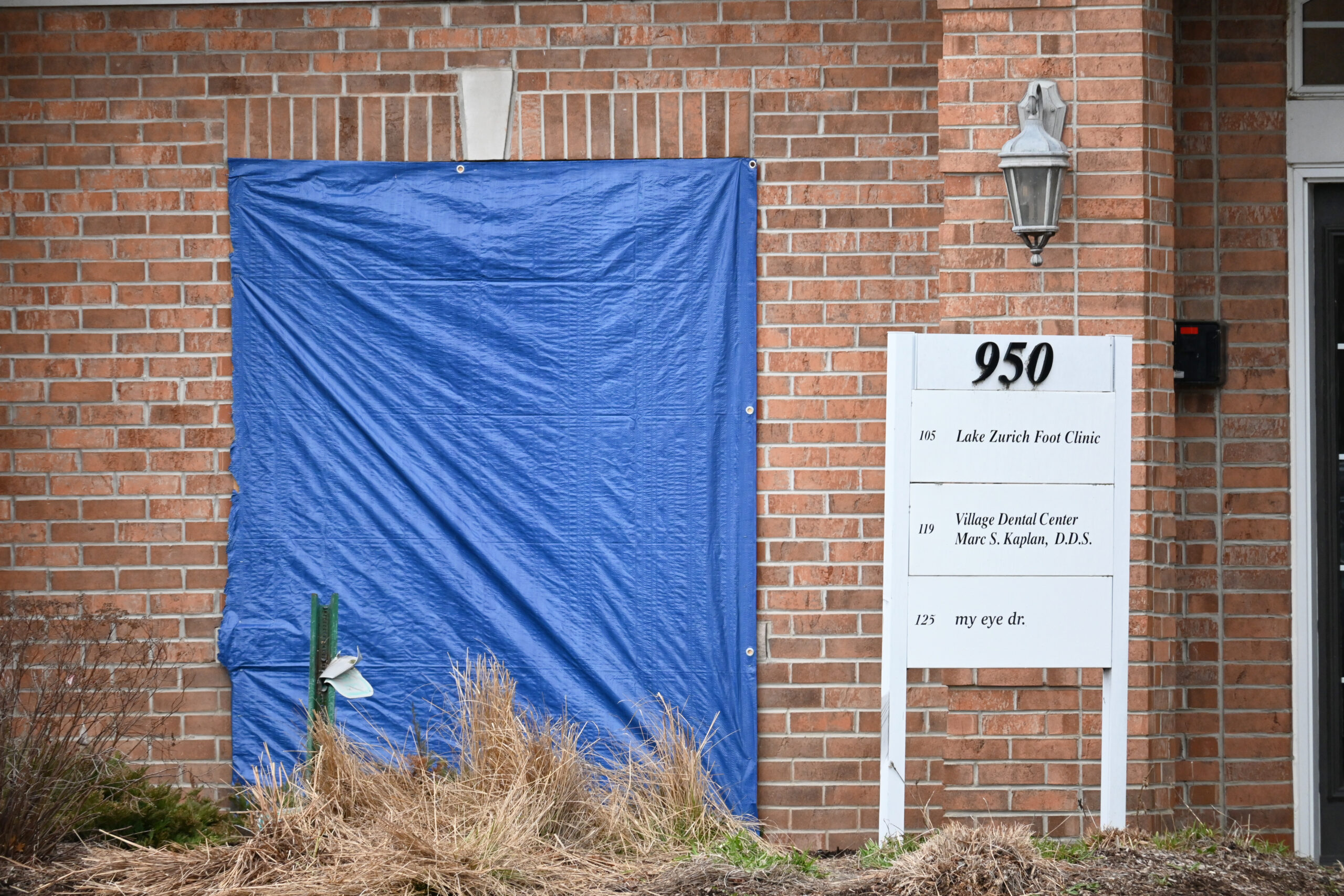 Driver transported to hospital after SUV crashes into medical office ...